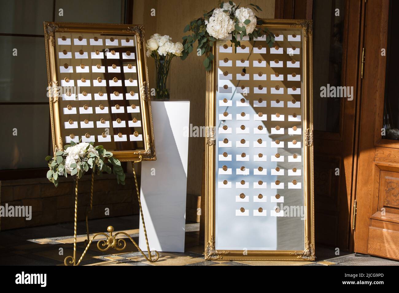 Beautiful elegant stylish wedding guest table list Stock Photo - Alamy
