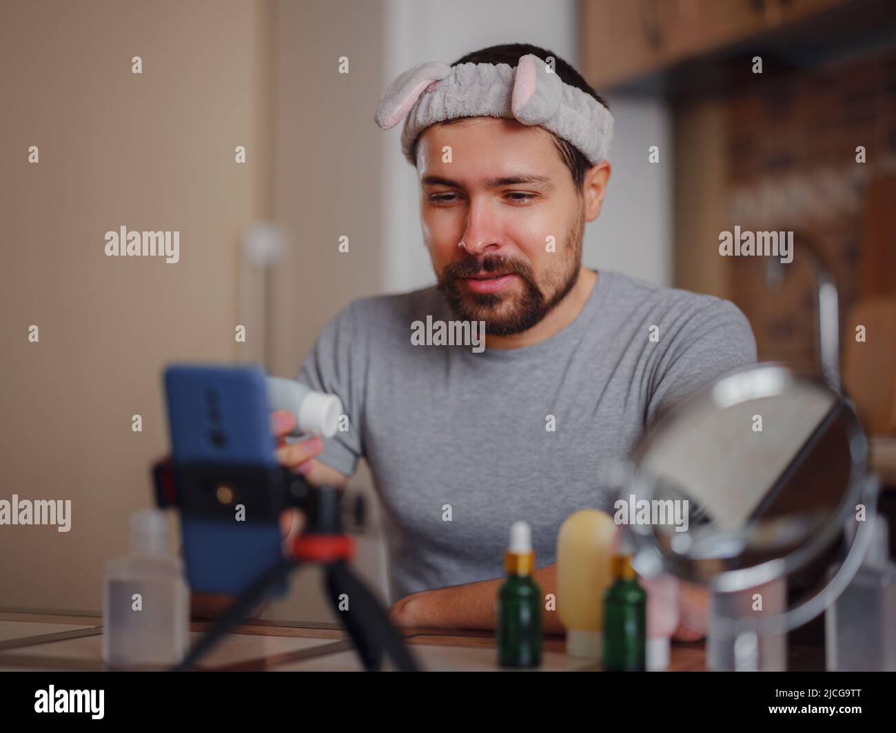 Men's beauty concept. caucAsian guy checking his skin. Beauty blogger ...