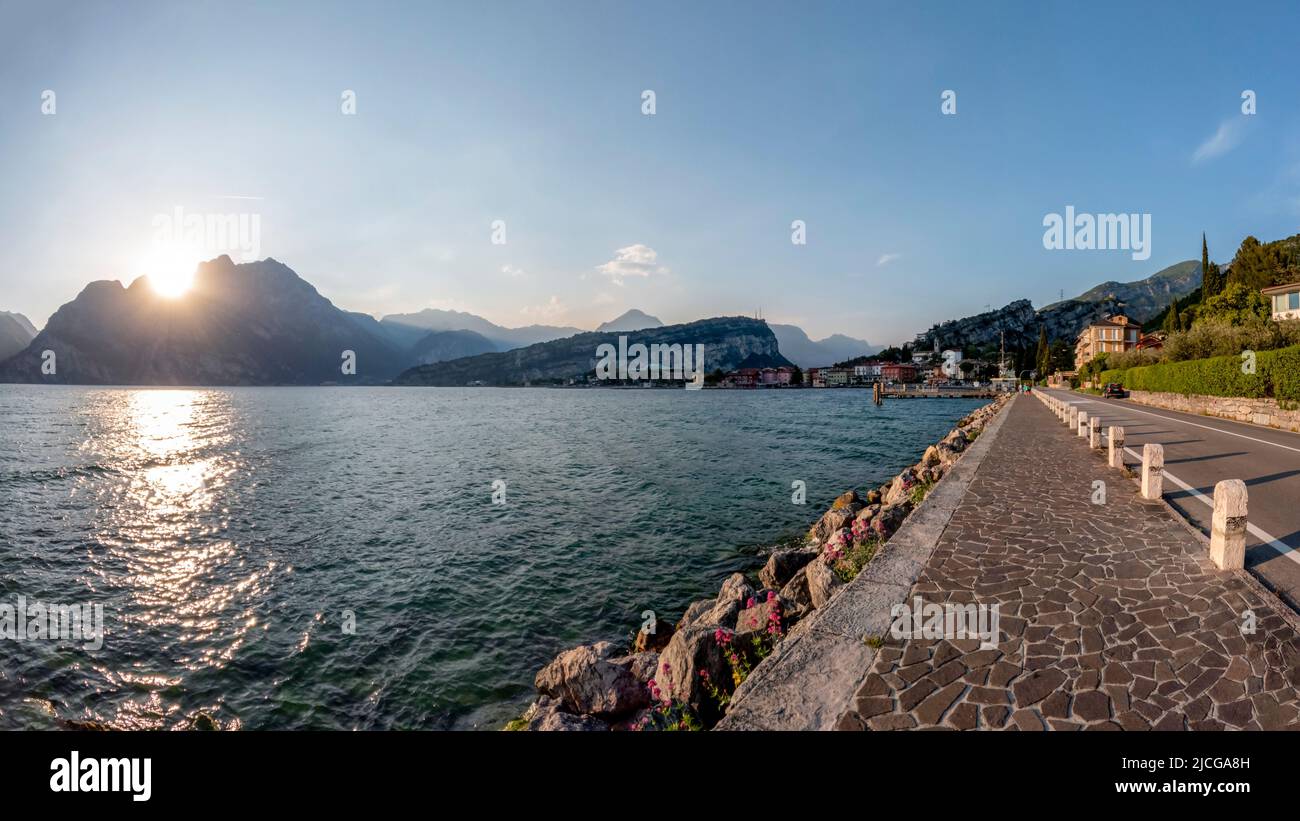 A panoramic view of the Riva del Garda lakefront, waterfront of the ...