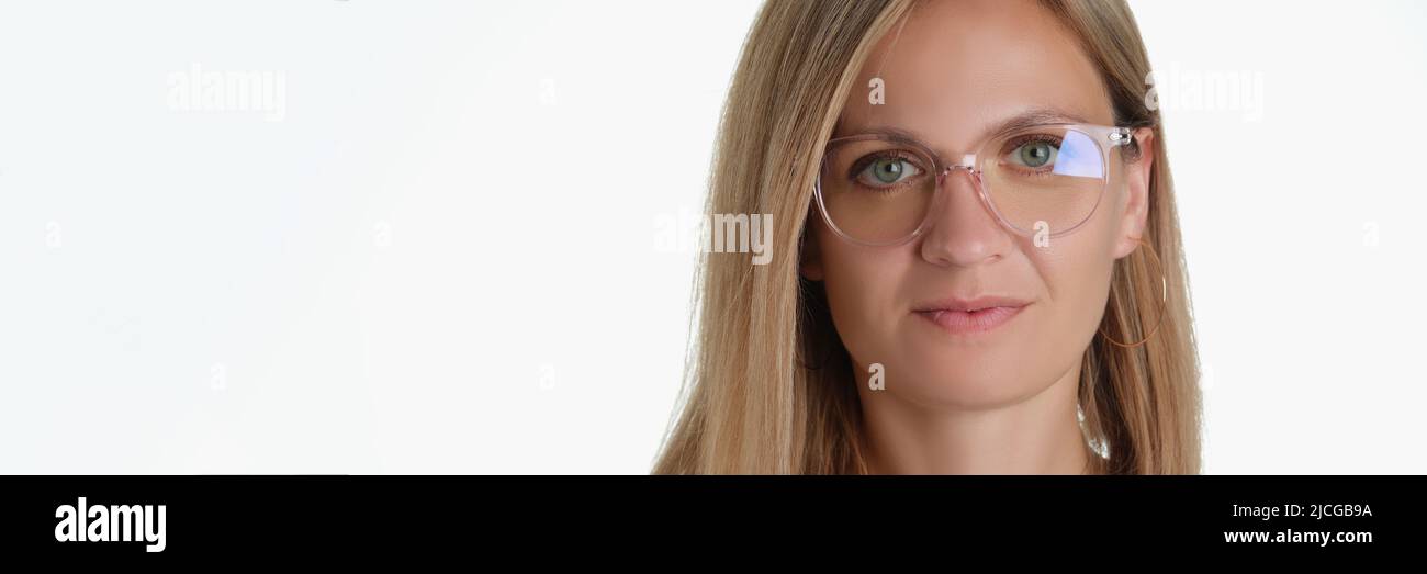 Beautiful blonde middle aged woman wearing glasses for better vision ...