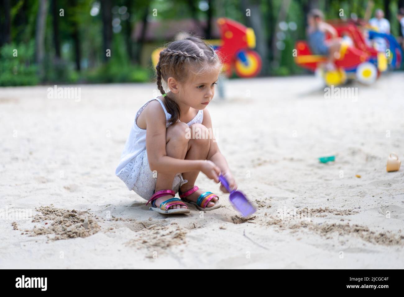 Little Girl Playing Sandbox Playground Digging Sand Shovel Building ...