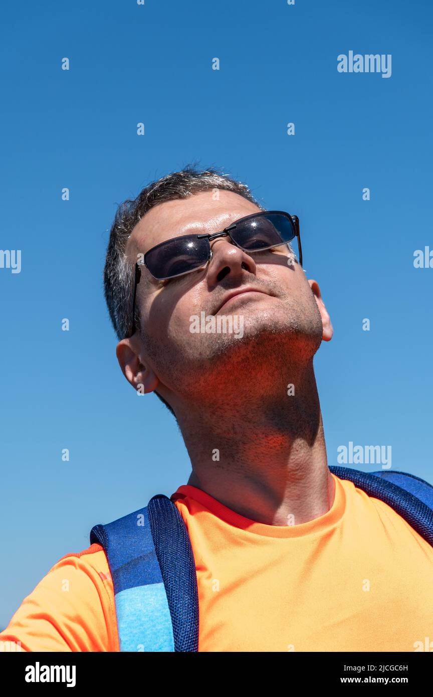 Old man sunbathing hi-res stock photography and images - Alamy