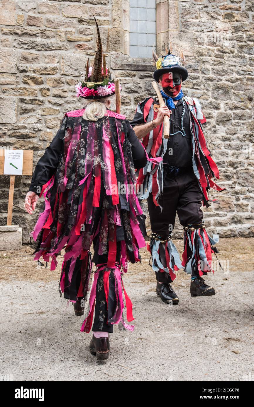 Flagcrackers of Craven border morris side in colourful rag jackets ...