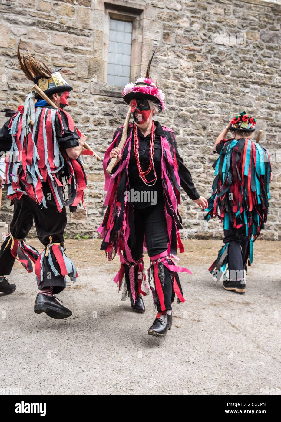 Flagcrackers of Craven border morris side in colourful rag jackets ...