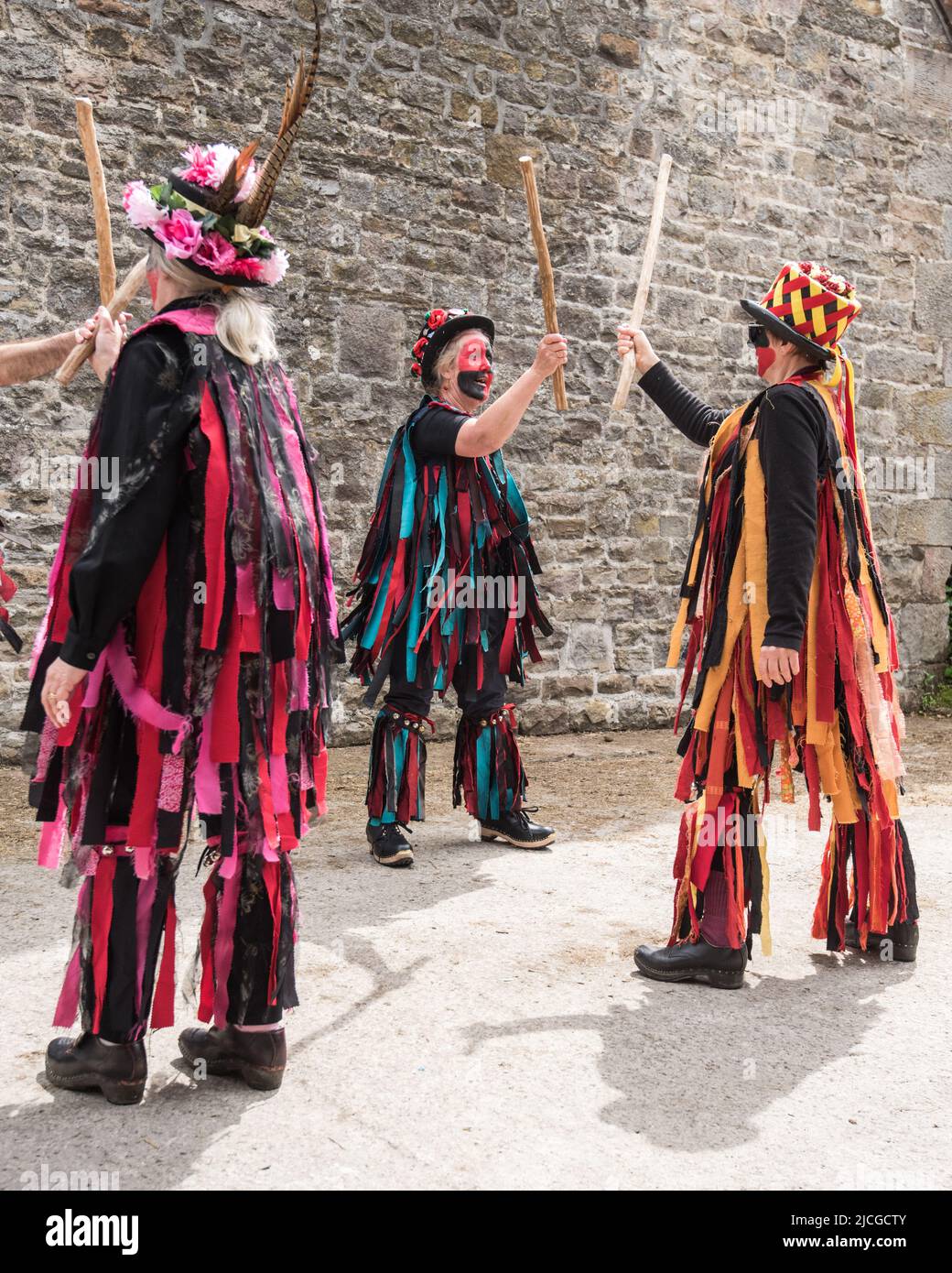 Flagcrackers of Craven border morris side in colourful rag jackets ...