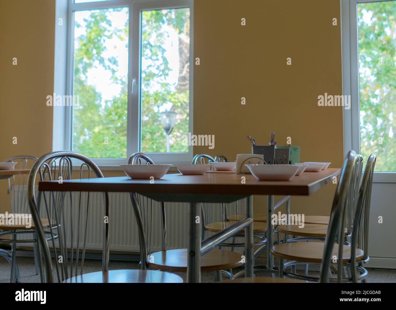 school kitchen canteen, set tables, canteen equipment, catering ...