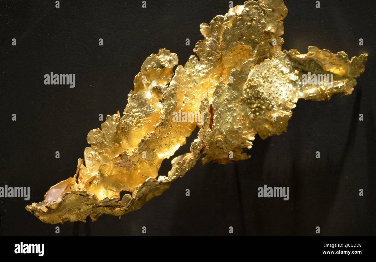 Unusual and stunning rare gold flakes in a freeform catching the light ...