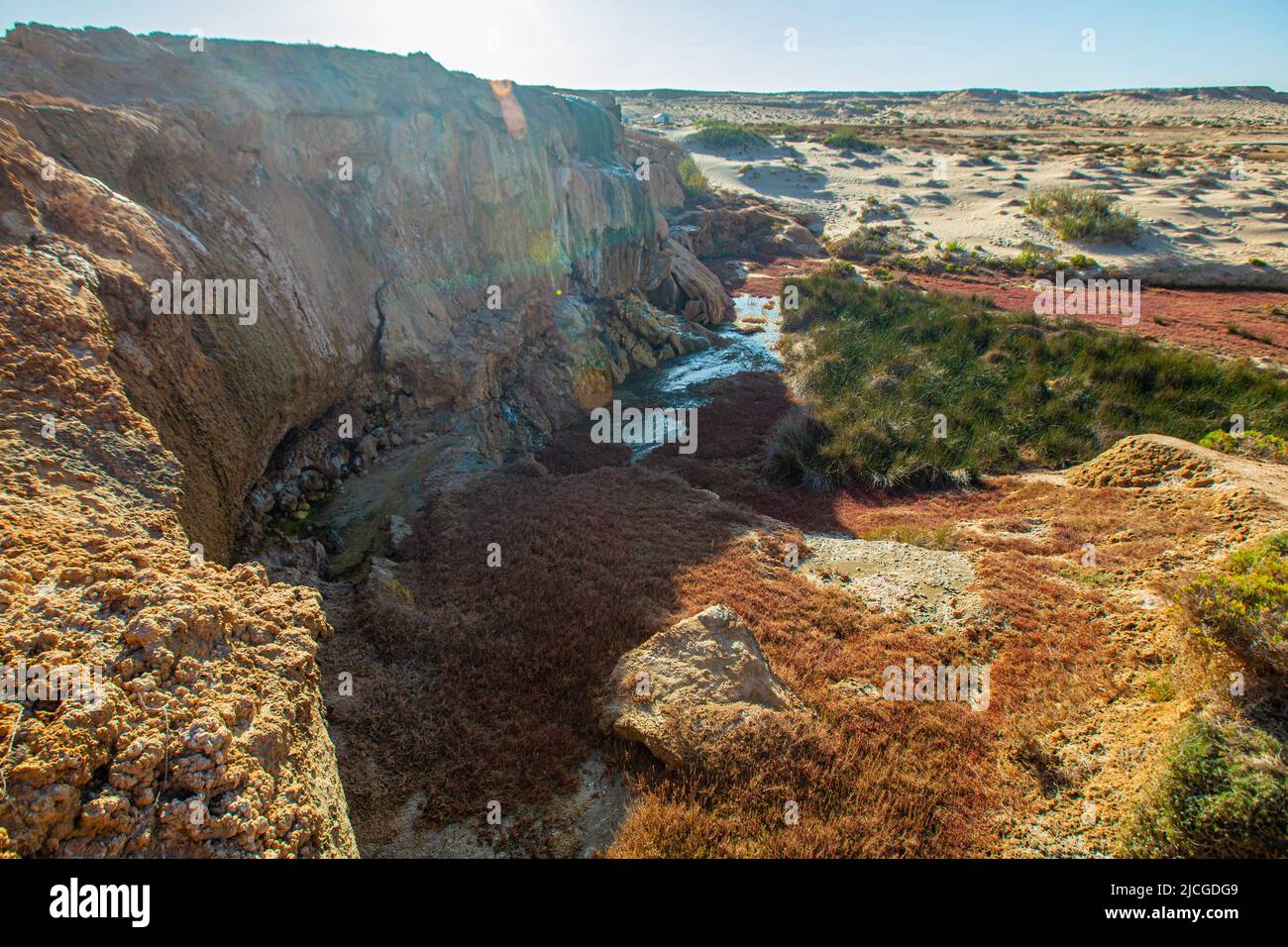 An oasis and a small waterfall in the middle of the Moroccan Sahara ...