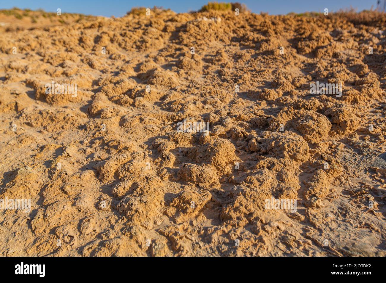 Coated sand in the middle of the Moroccan desert Stock Photo - Alamy
