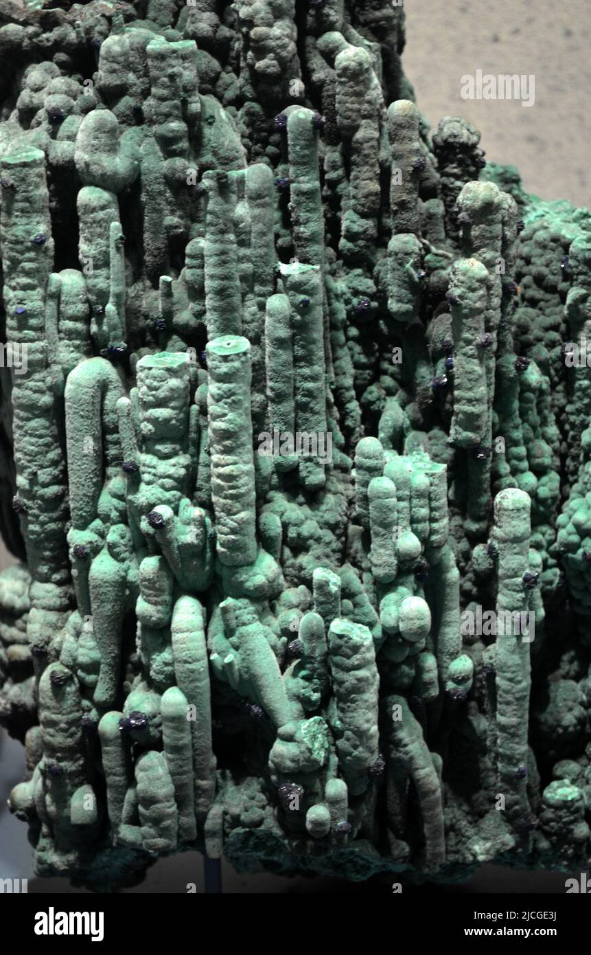 Unusually shaped green malachite crystals growing in a large cluster ...