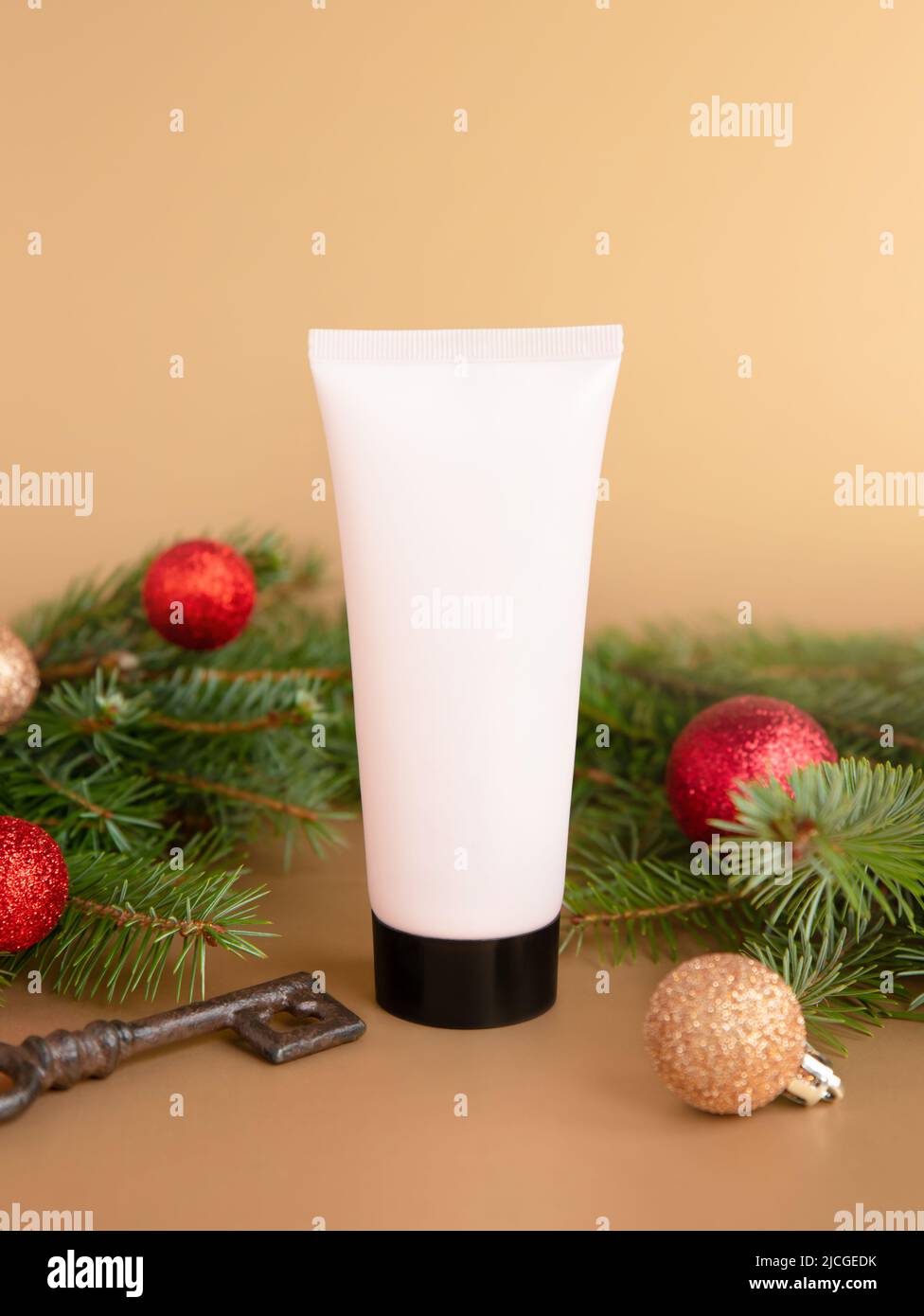 Pink squeeze bottle cosmetic tube with screw black cap, Christmas fir ...
