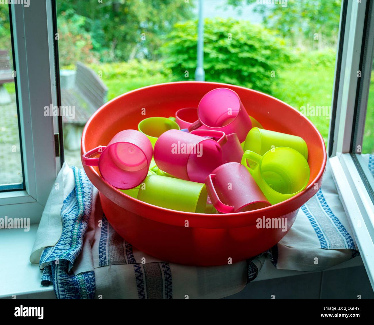 school kitchen canteen, colored plastic cups, canteen equipment ...