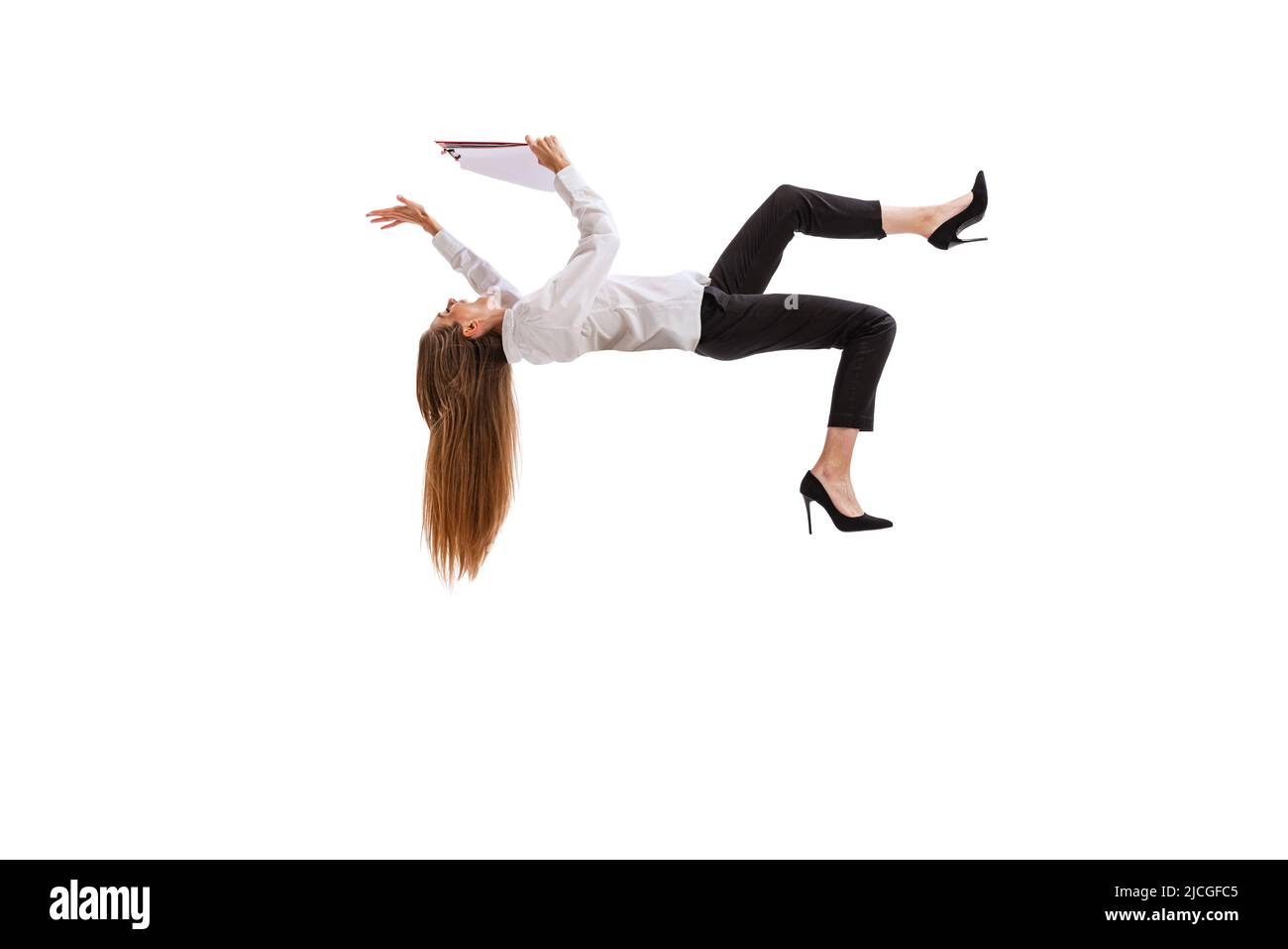 Man in suit falling over Cut Out Stock Images & Pictures - Alamy
