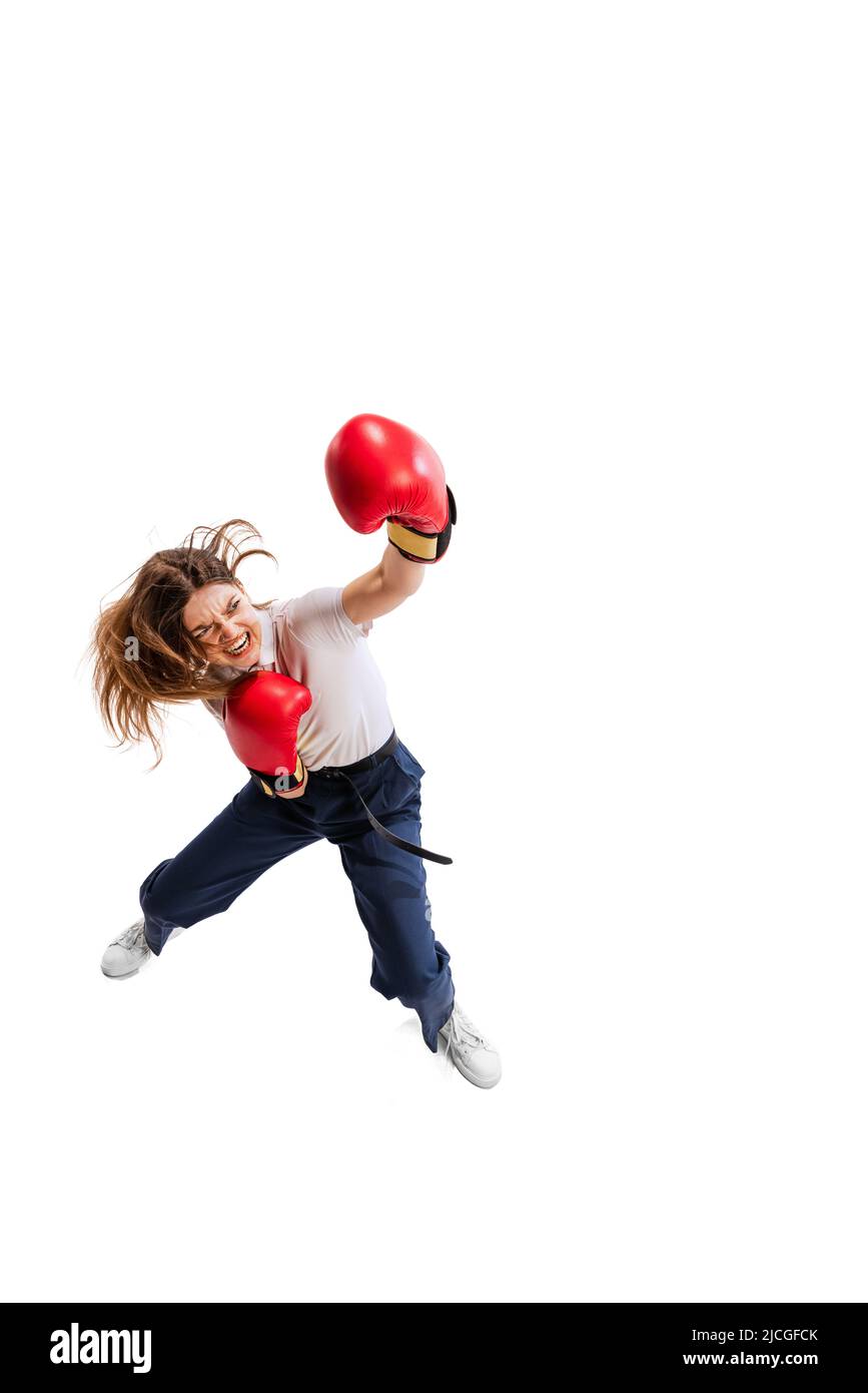 Full-length portrait of young woman, employee in office cloth and ...