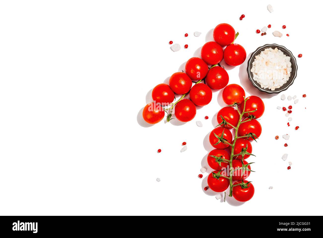 Cooking background with tomato cherry, sea salt, and rose peppercorn ...