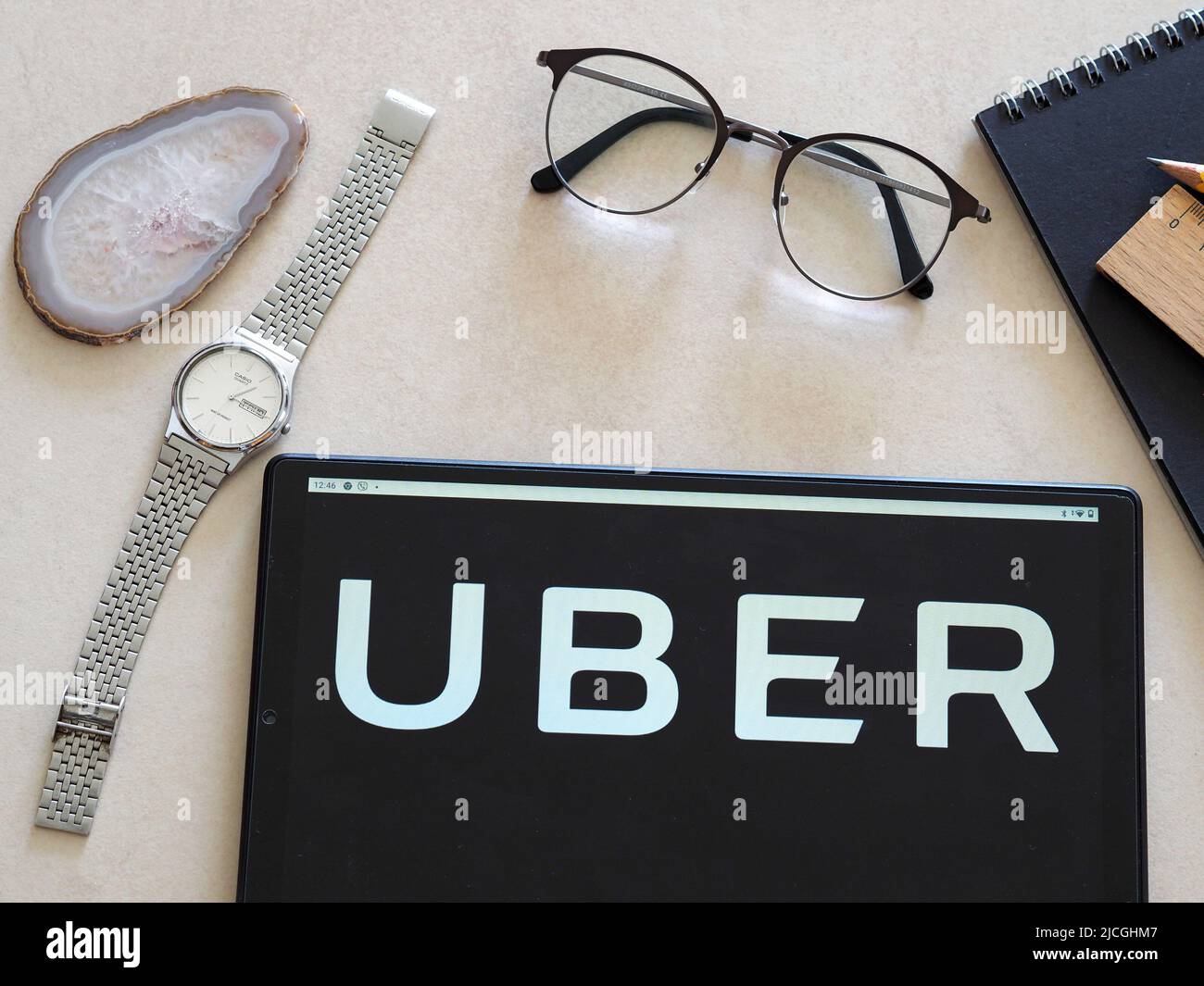 In this photo illustration, the Uber Technologies Inc. logo seen ...