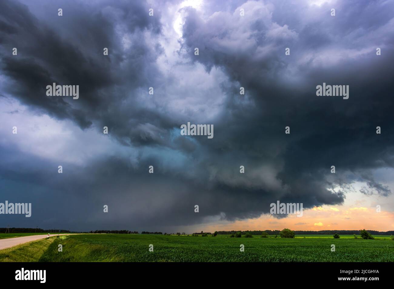 Storm clouds over field, tornadic supercell, extreme weather, dangerous ...