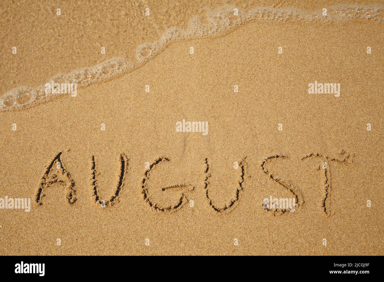 August month text written on hi-res stock photography and images - Alamy