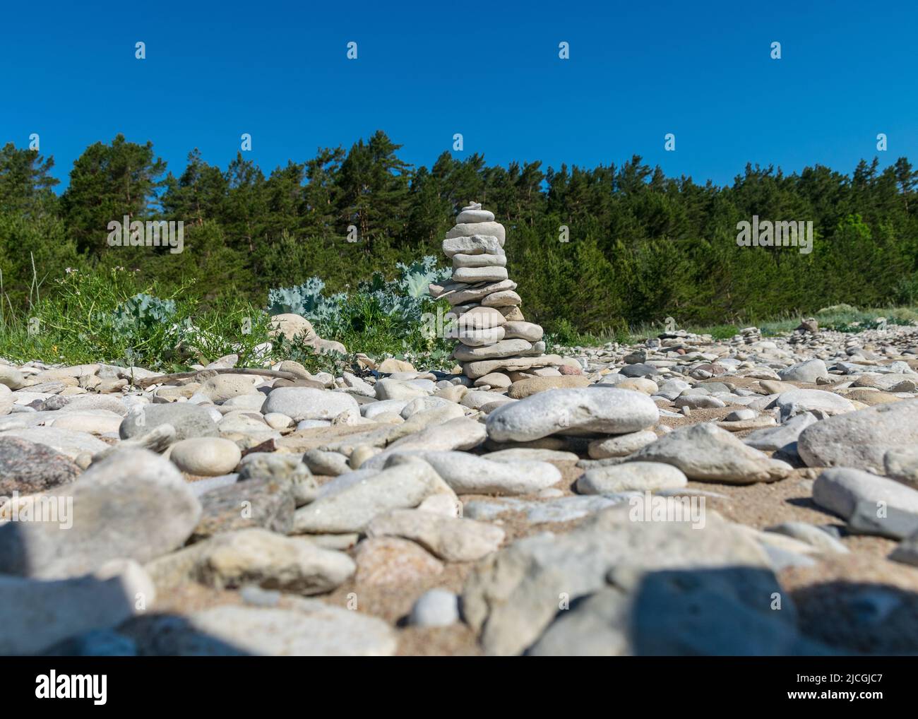 picture with beautiful white stone piles by the sea, these objects were ...