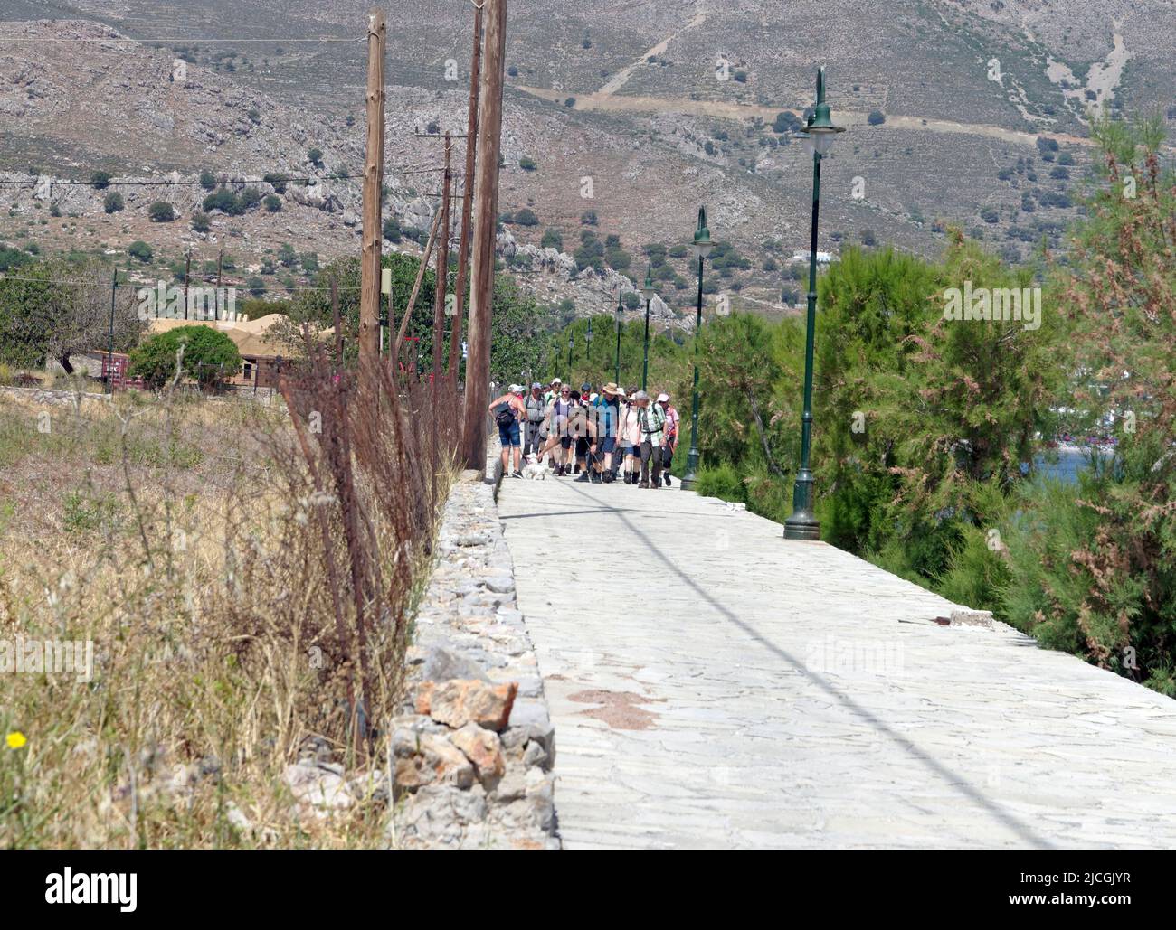 Group of serious walkers on Tilos island, near Rhodes Stock Photo - Alamy