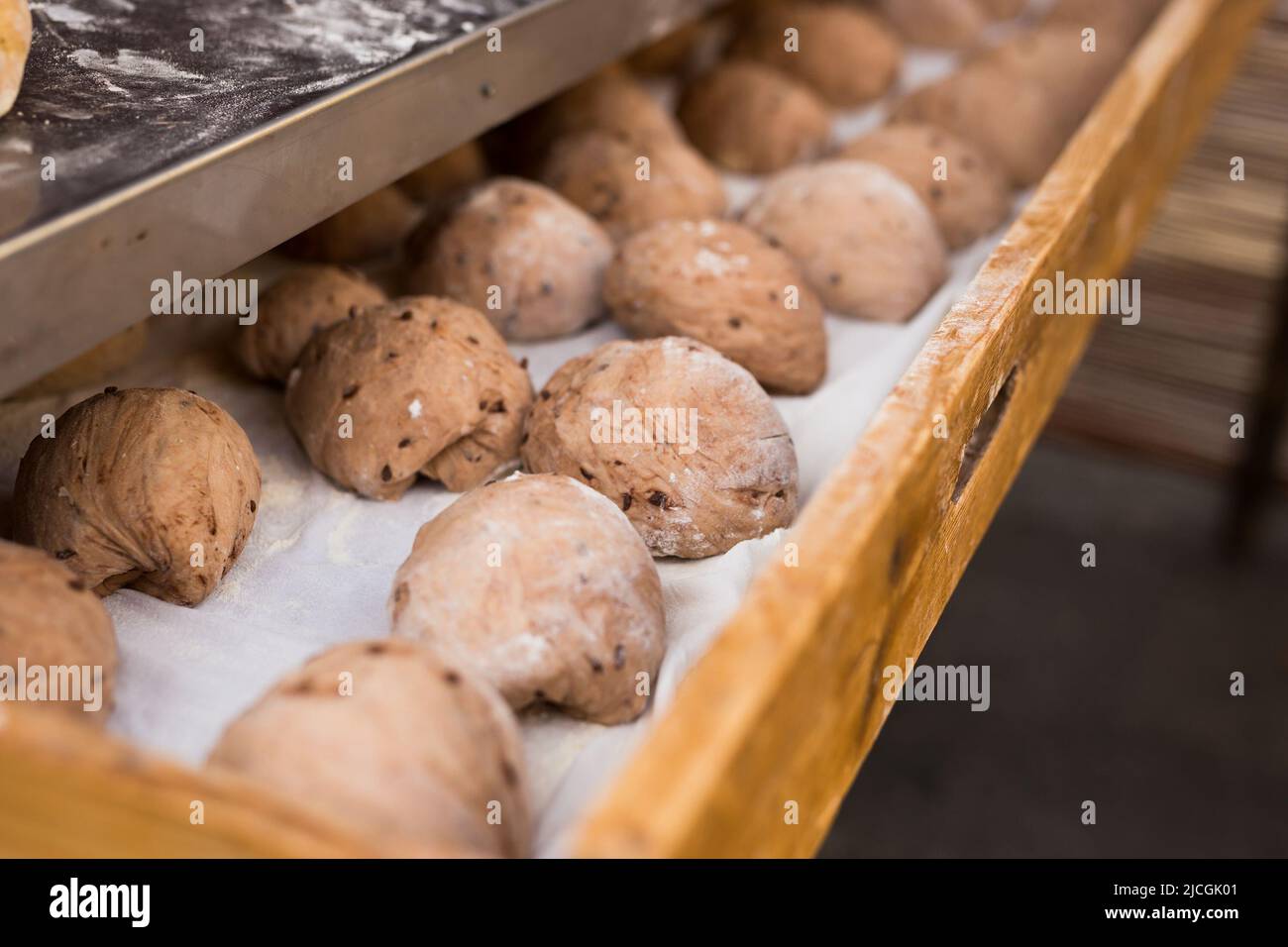 ready made rolls of freshly baked grain bread in drawer Stock Photo - Alamy