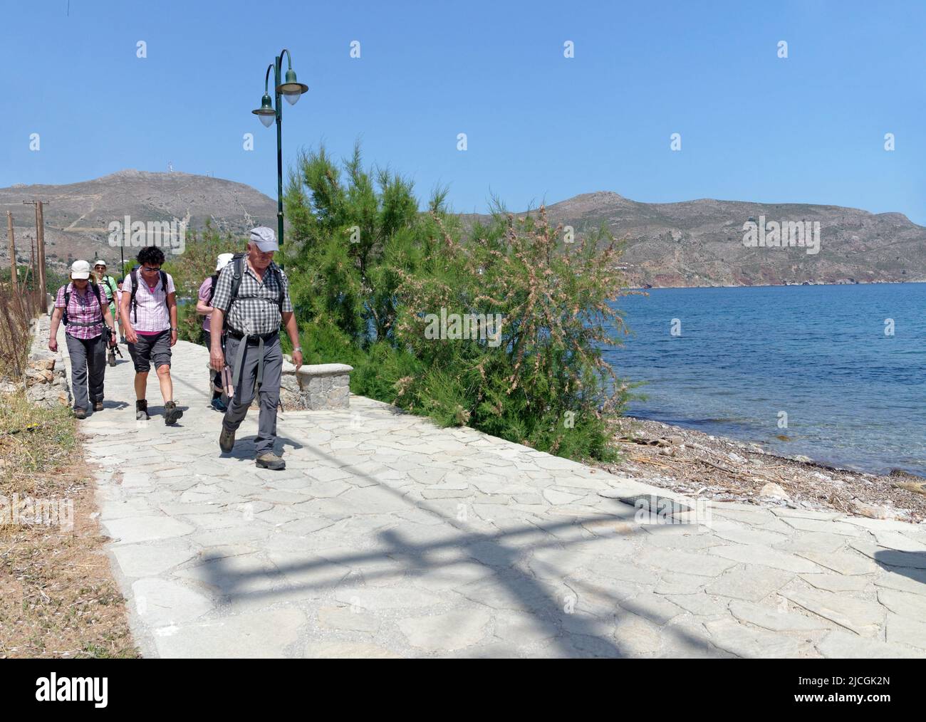 Group of serious walkers on Tilos island, near Rhodes Stock Photo - Alamy