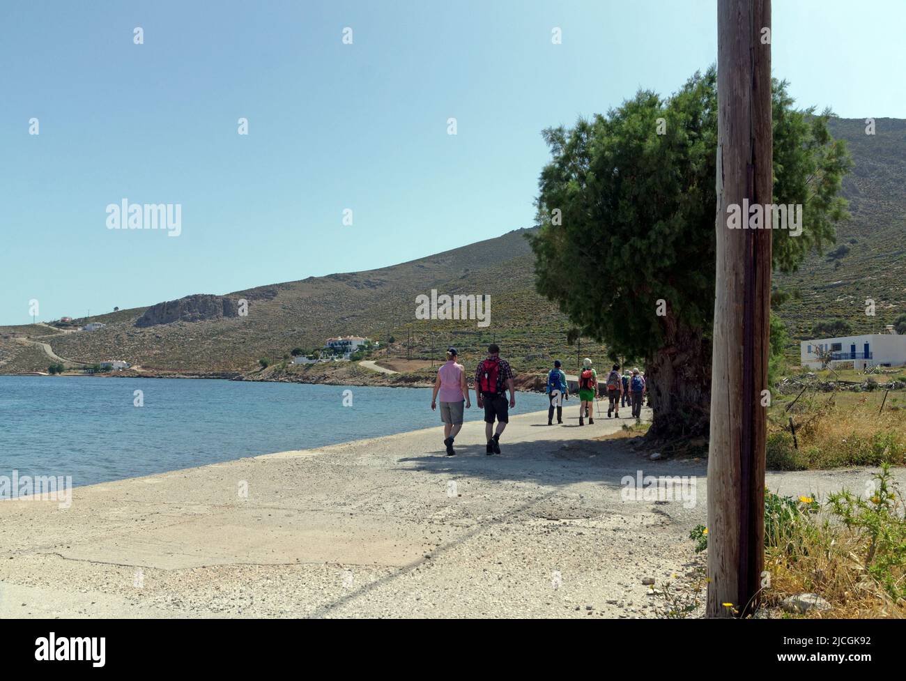 Group of serious walkers on Tilos island, near Rhodes Stock Photo - Alamy