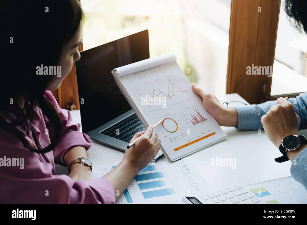 Negotiation, Analysis, Discussion, Asian woman economist and marketer ...