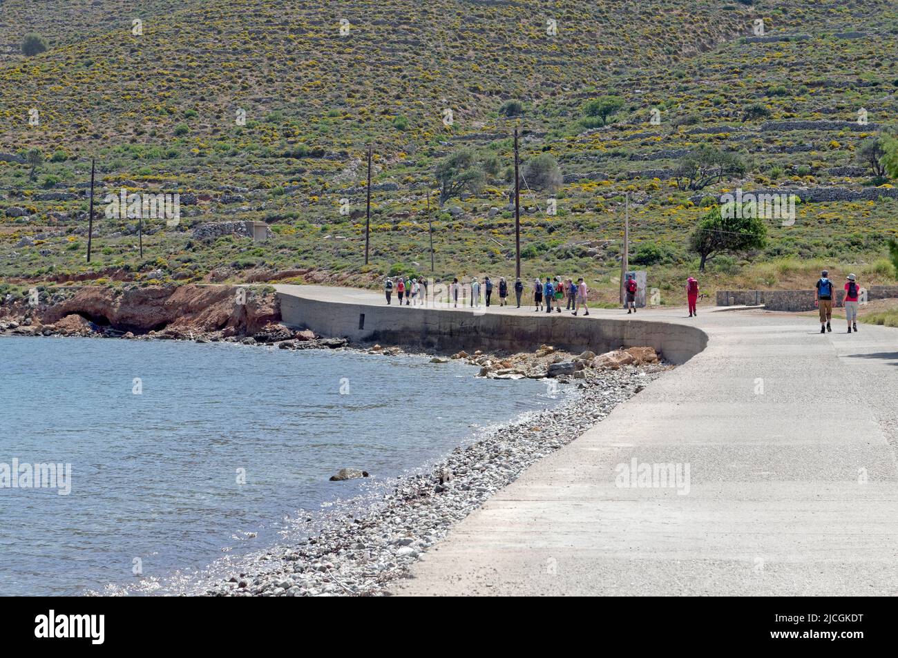 Group of serious walkers on Tilos island, near Rhodes Stock Photo - Alamy