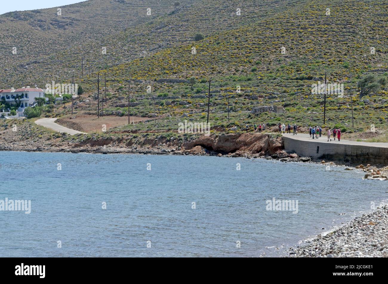 Group of serious walkers on Tilos island, near Rhodes Stock Photo - Alamy