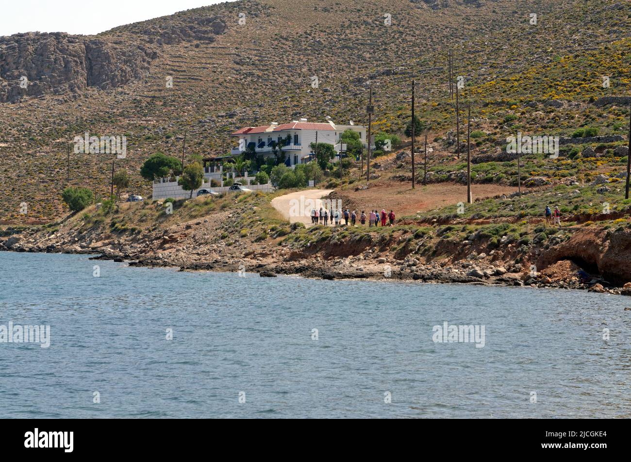 Group of serious walkers on Tilos island, near Rhodes Stock Photo - Alamy