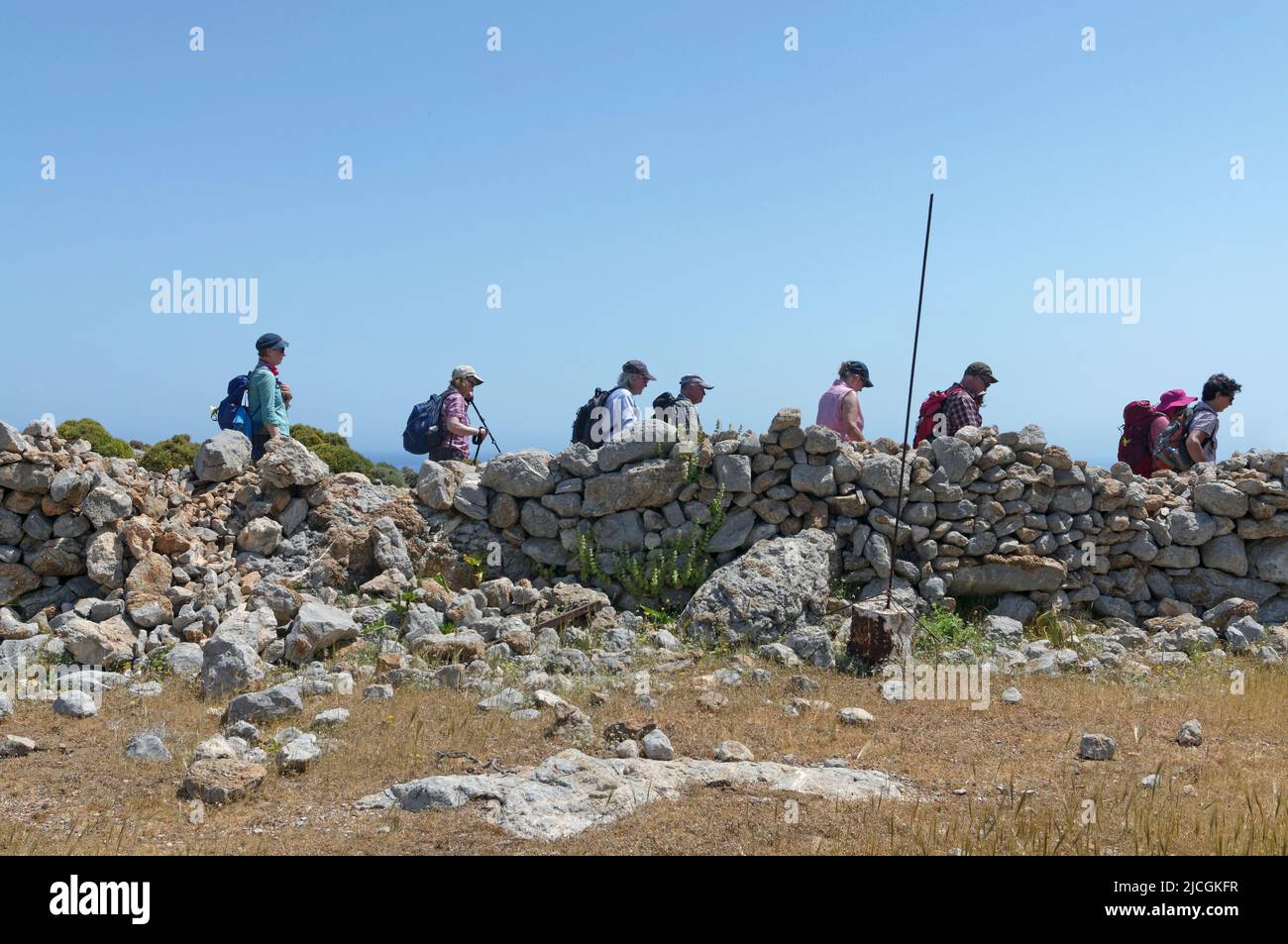Group of serious walkers on Tilos island, near Rhodes Stock Photo - Alamy