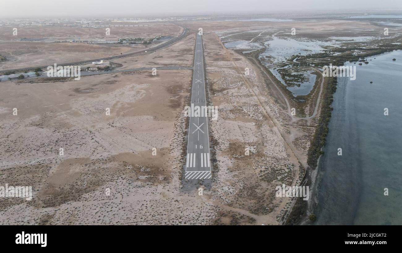 Runway in the desert, Umm al Quwain, UAE Stock Photo - Alamy