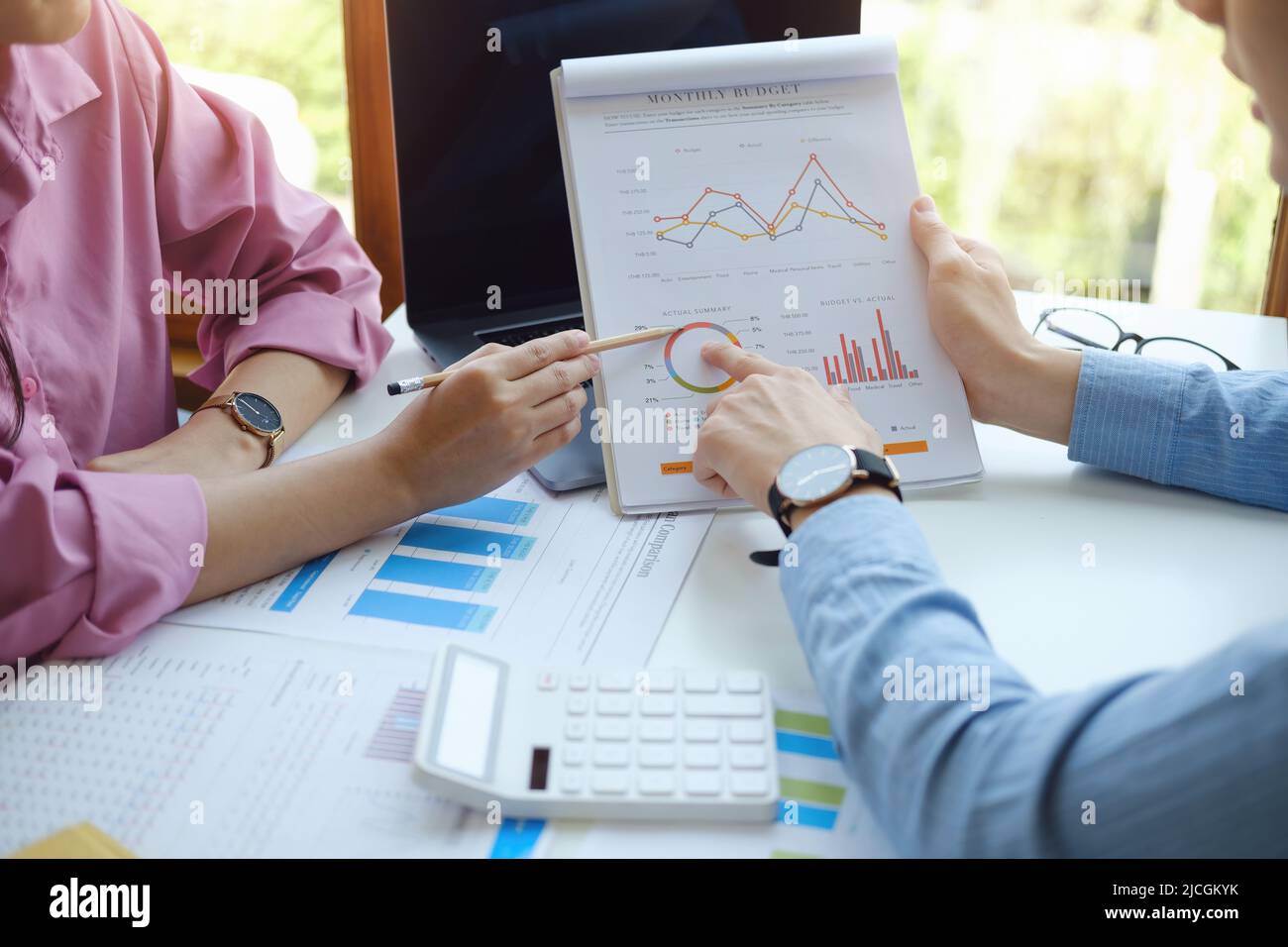 Teamwork concept, consultation, economist pointing budget, finance and ...