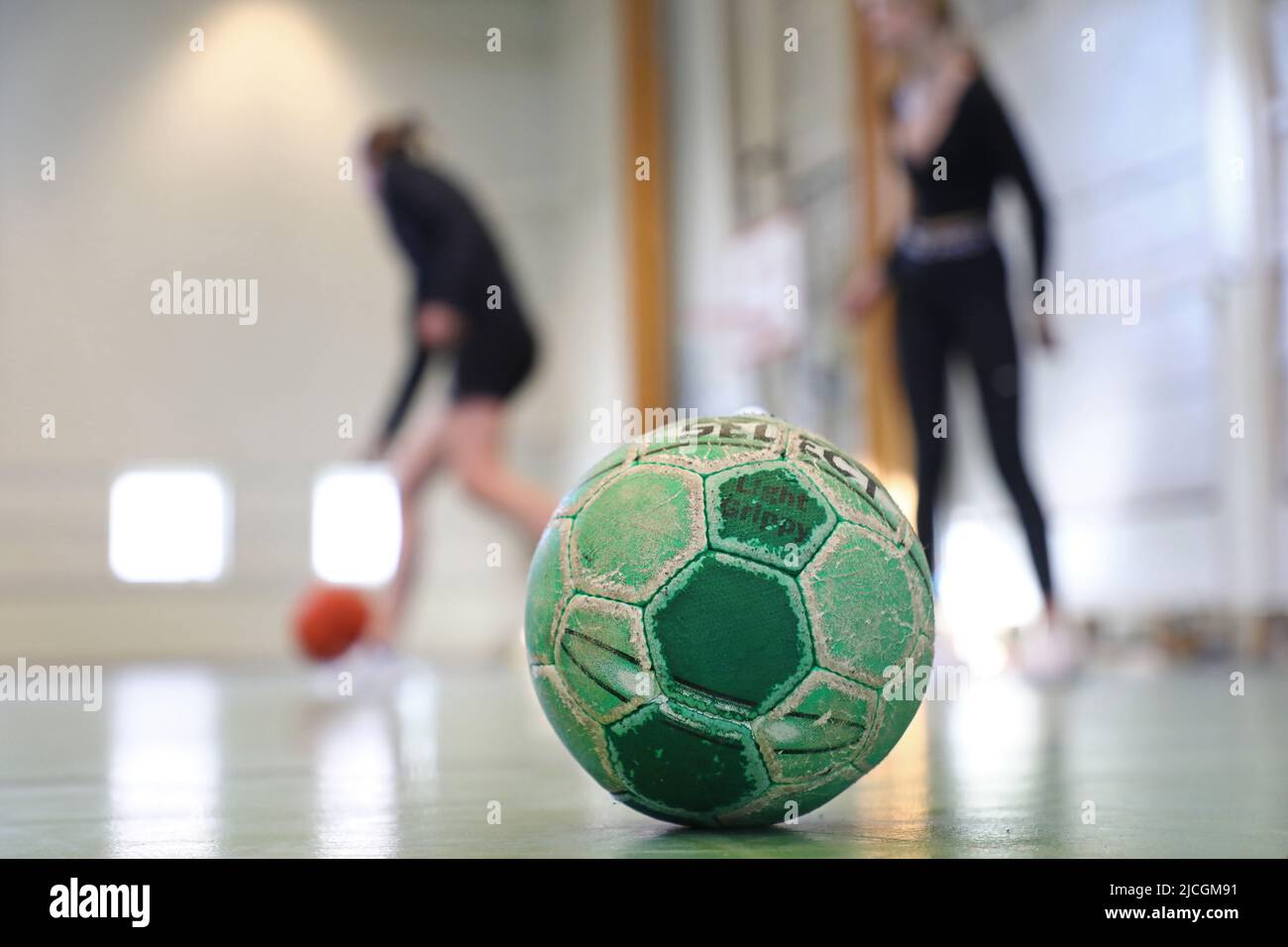 Students from a school during a sports lesson in a sports hall. Here is ...