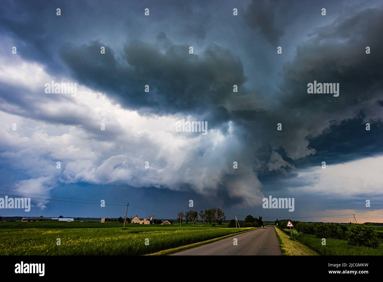 Storm clouds over field, tornadic supercell, extreme weather, dangerous ...