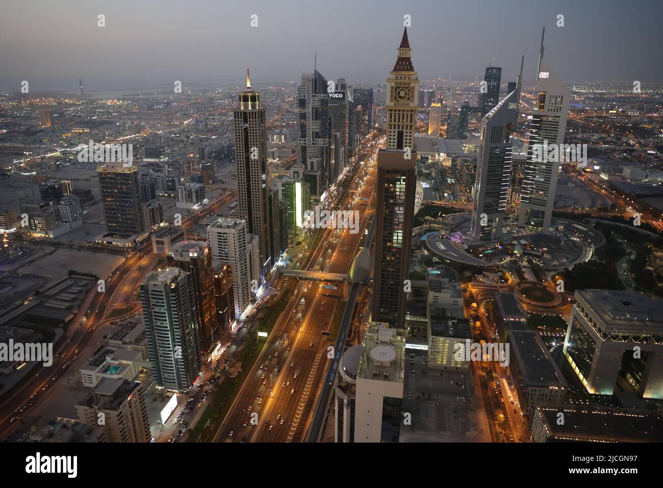 Night view on Skyscrapers on Sheikh Zayed Road, yellow street lights ...