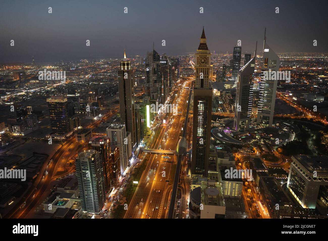 Night view on Skyscrapers on Sheikh Zayed Road, yellow street lights ...