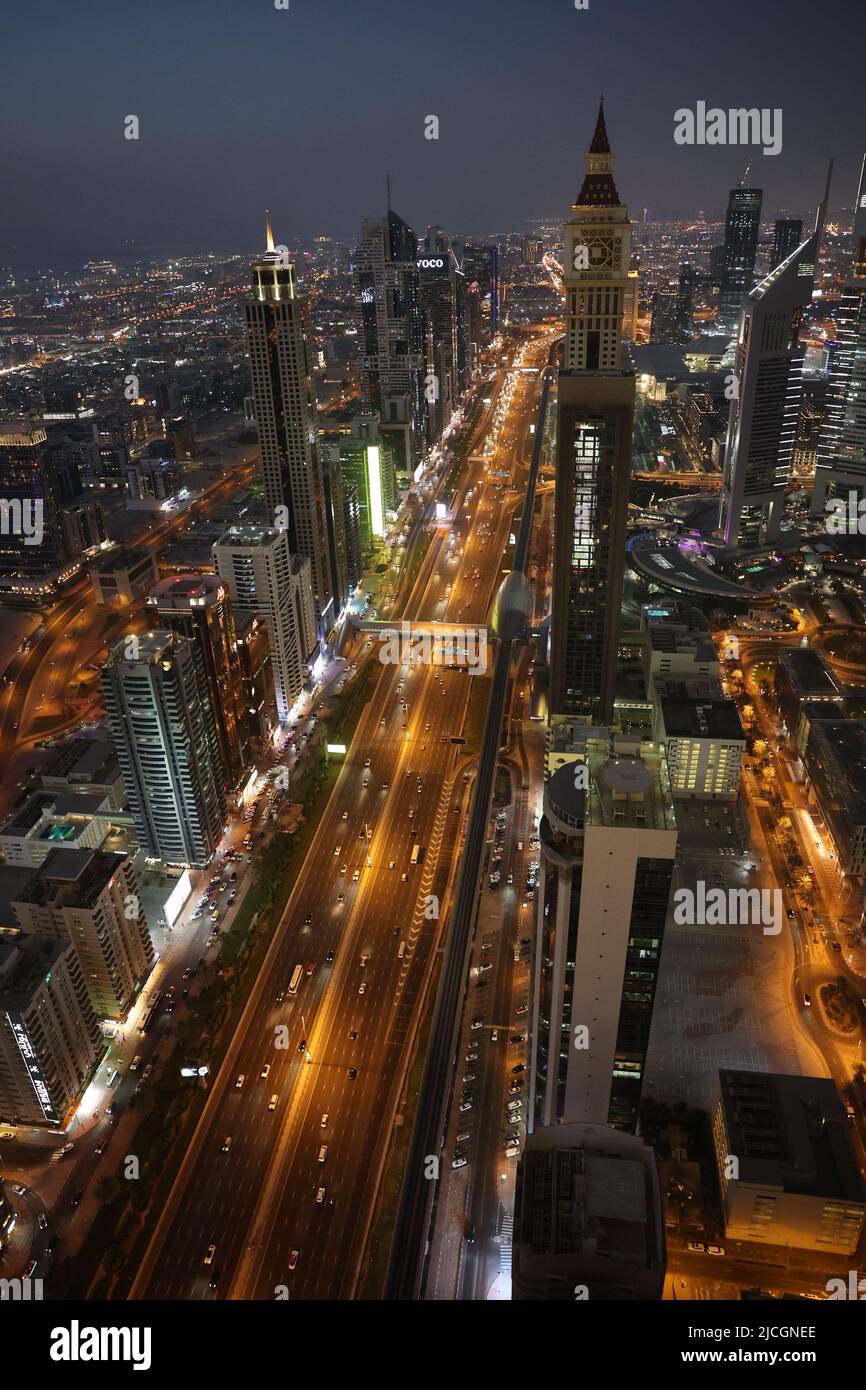 Night view on Skyscrapers on Sheikh Zayed Road, yellow street lights ...