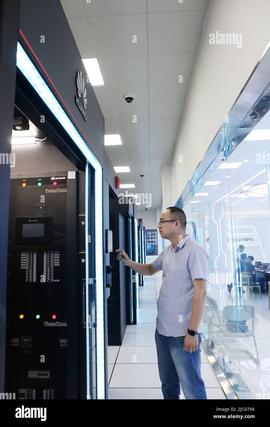 CHONGQING, CHINA - JUNE 13, 2022 - A teacher works in a computer room ...