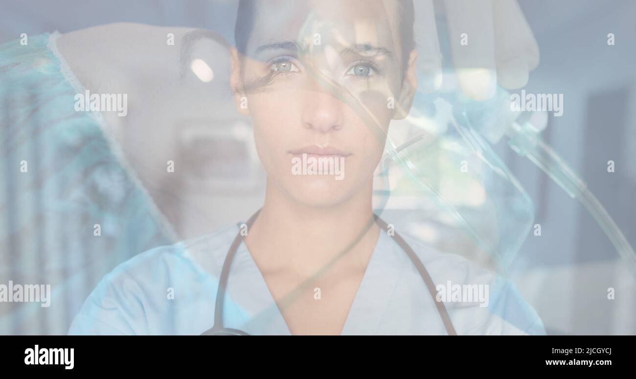 Double exposure of portrait of young female caucasian doctor and ...