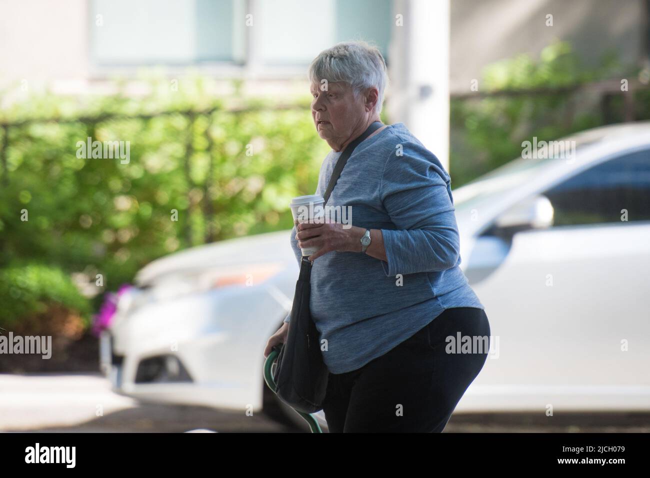 Van attack survivor Cathy Riddle makes her way towards the Toronto ...
