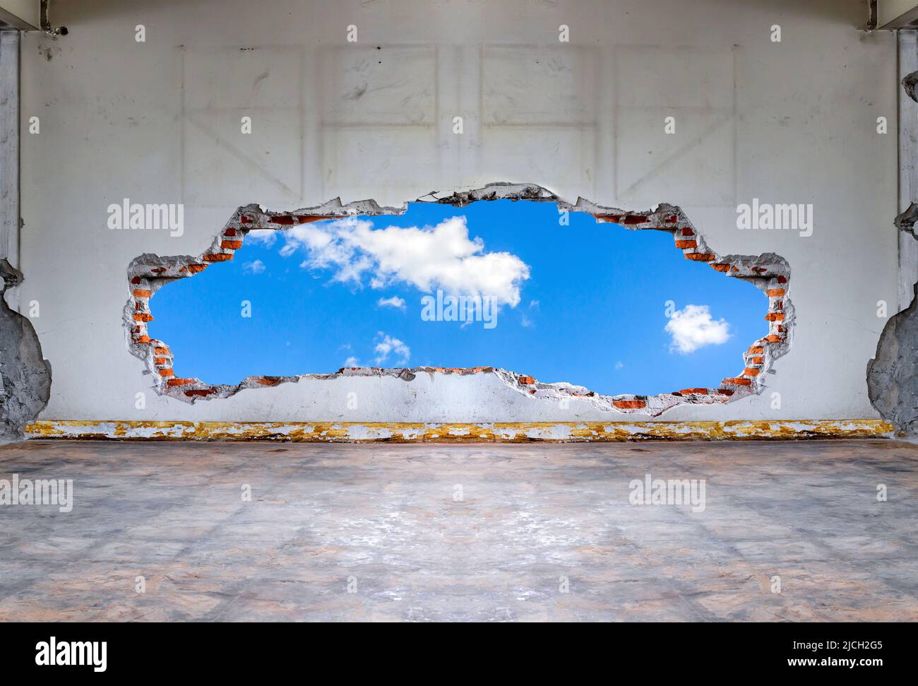 Interior of abandoned and ruined house with broken wall on blue sky ...