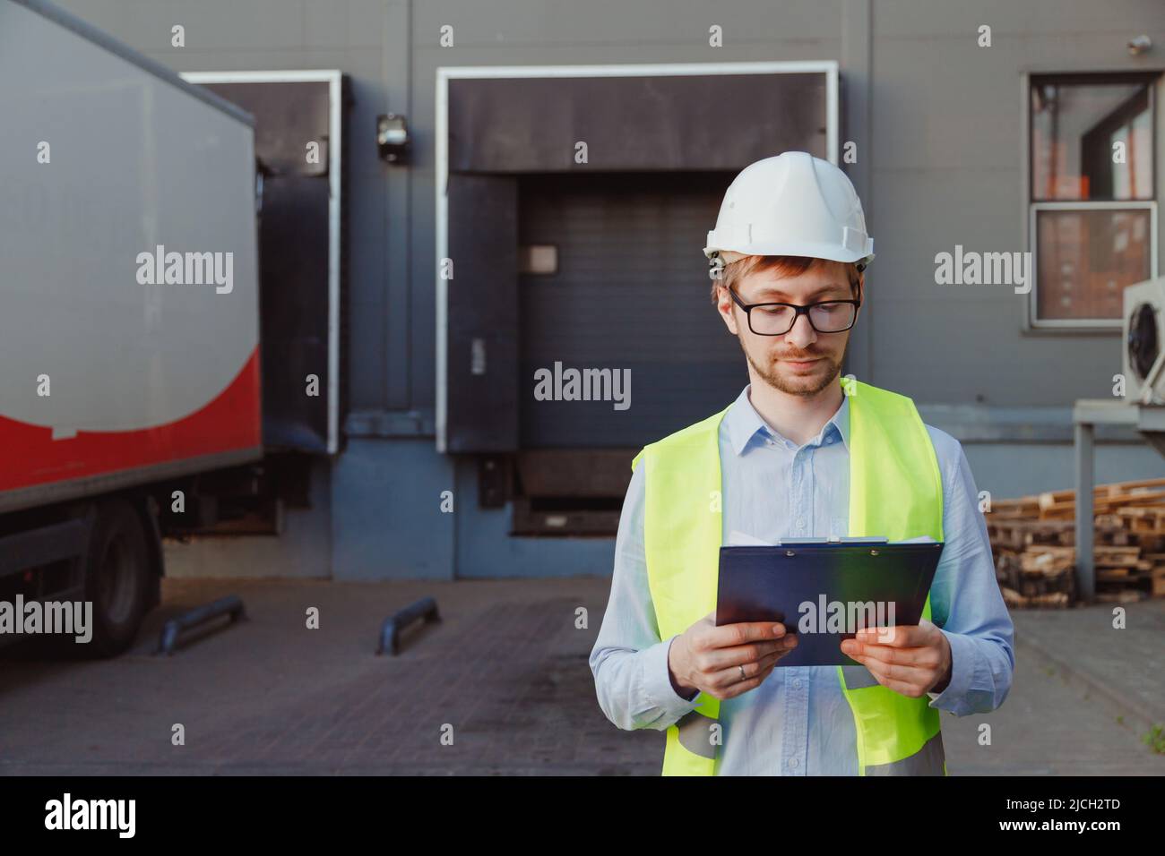 Industrial manager portrait at warehouse or store checking goods ...