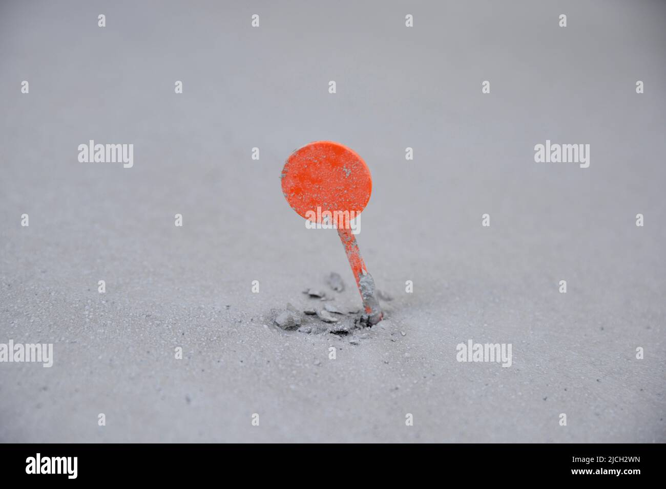 freshly cured concrete screed on construction site in loft in a family ...