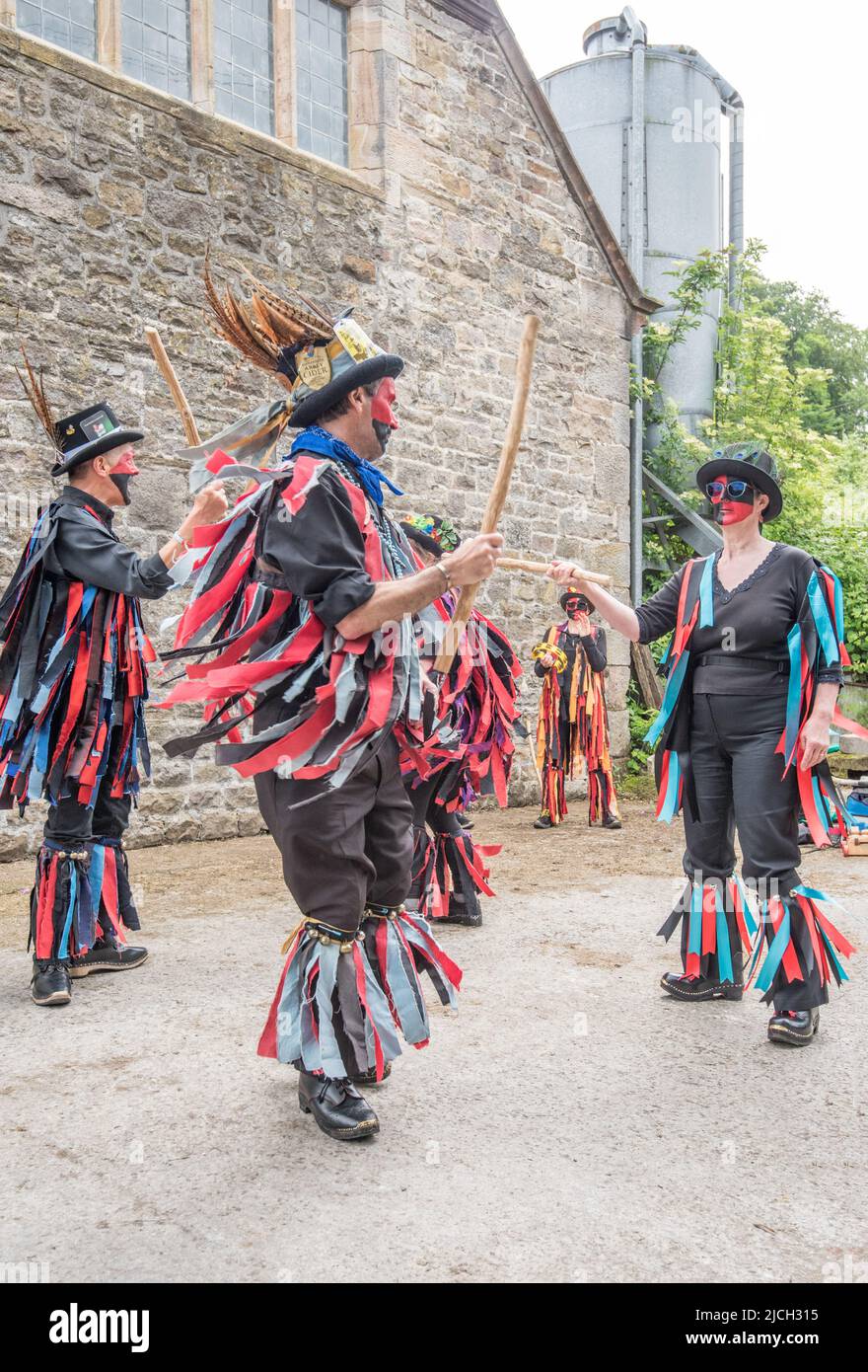 Flagcrackers of Craven border morris side in colourful rag jackets ...