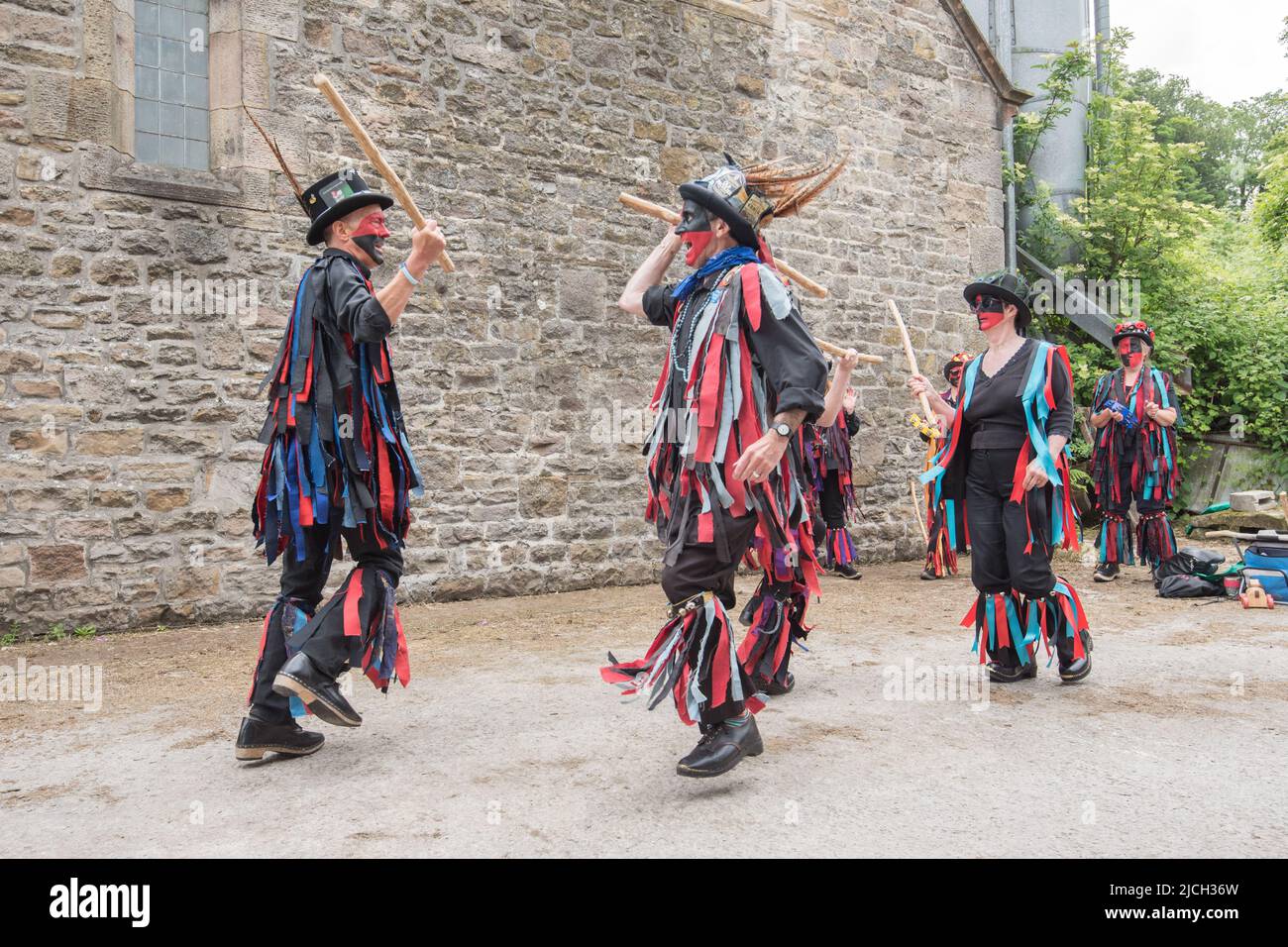 Flagcrackers of Craven border morris side in colourful rag jackets ...