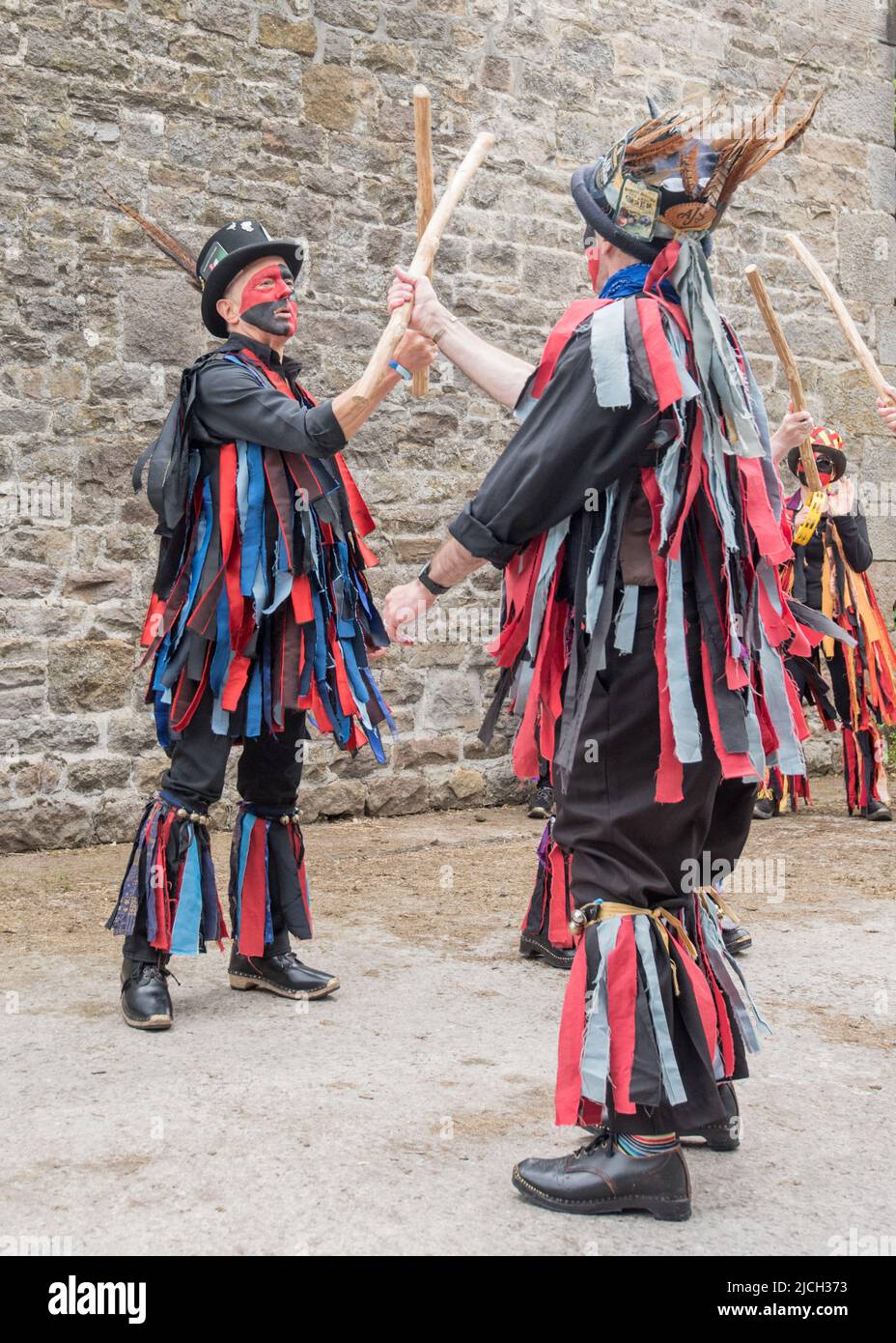 Flagcrackers of Craven border morris side in colourful rag jackets ...