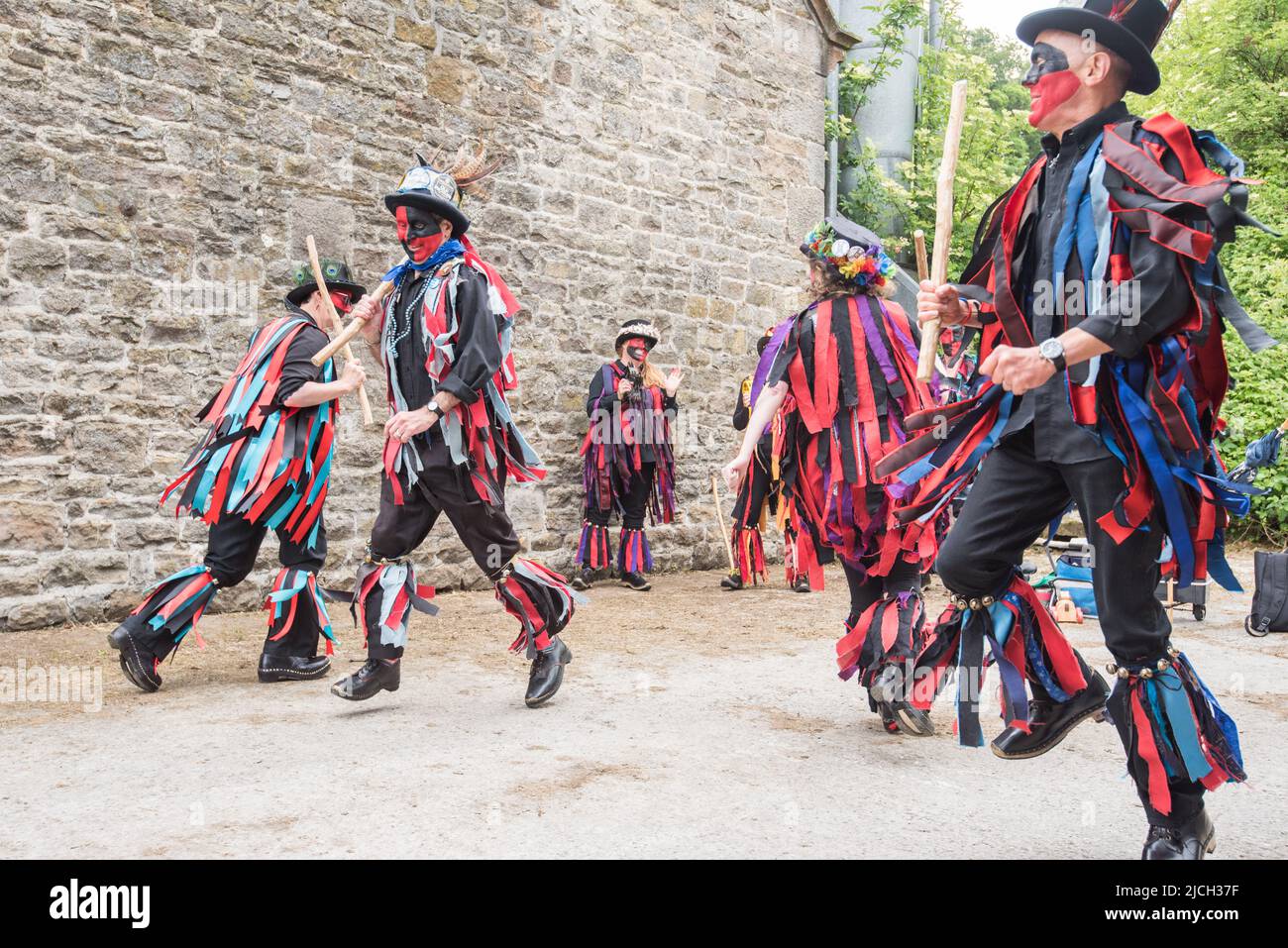 Flagcrackers of Craven border morris side in colourful rag jackets ...
