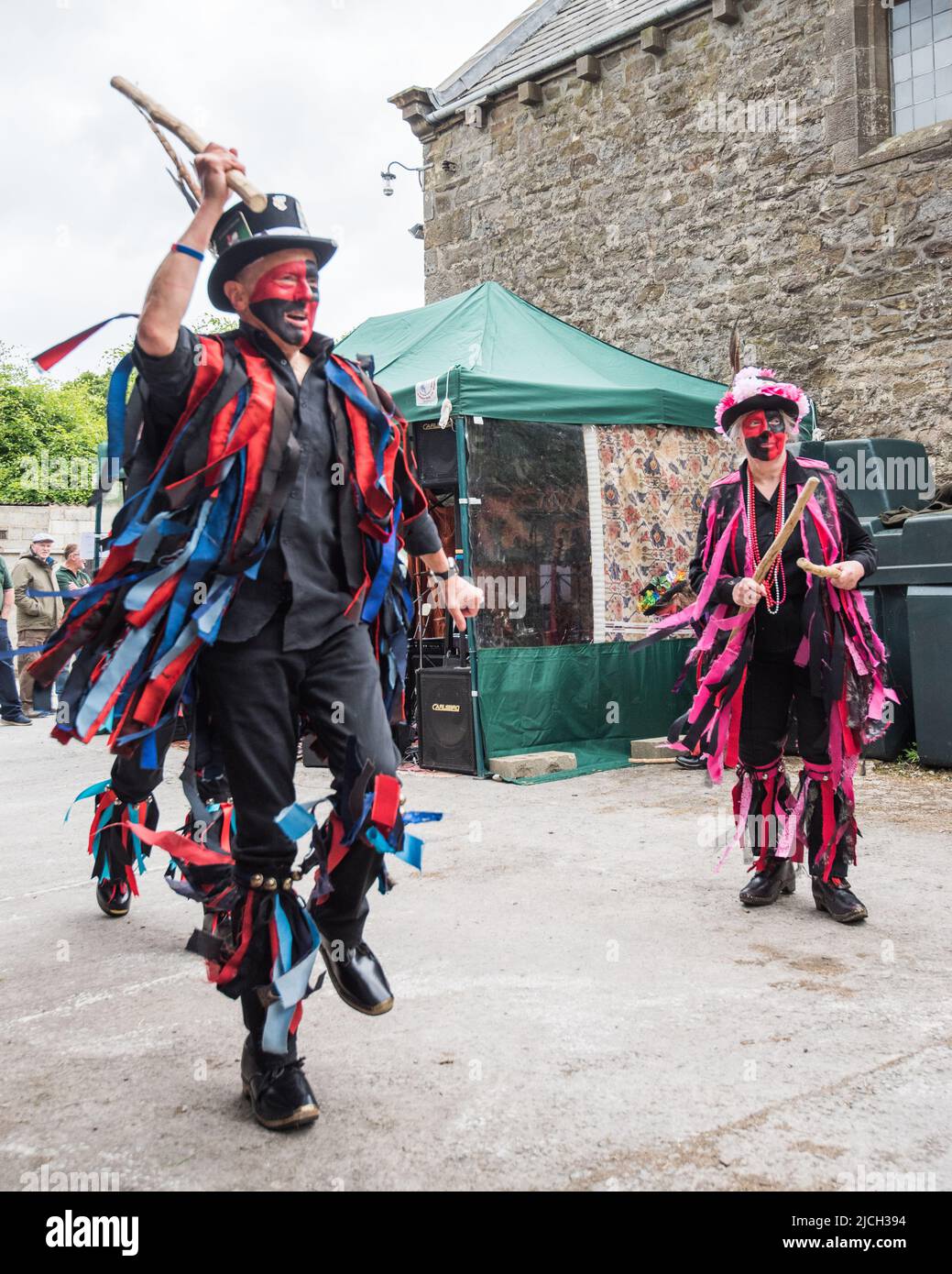Flagcrackers of Craven border morris side in colourful rag jackets ...